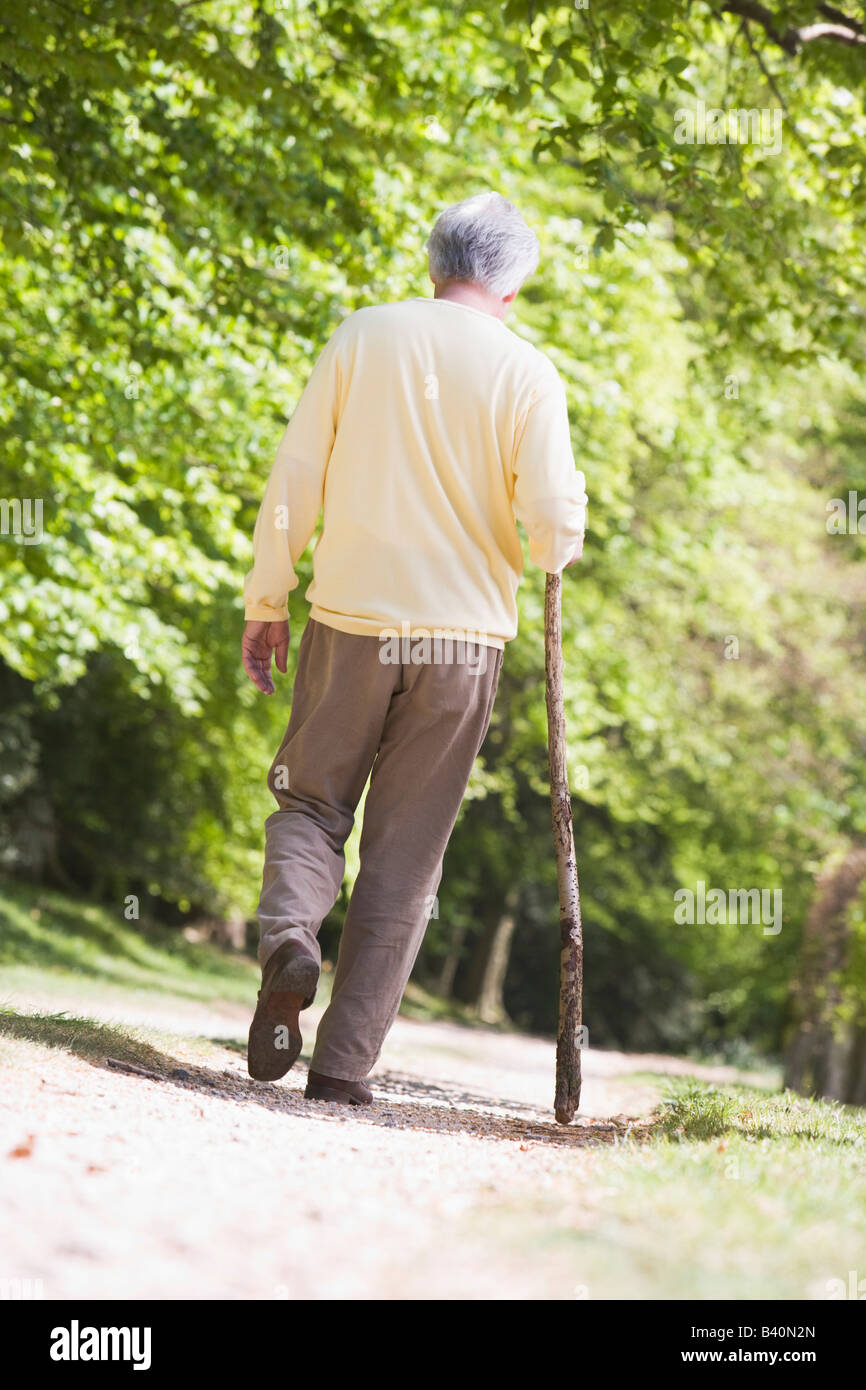Man walking outdoors Stock Photo - Alamy