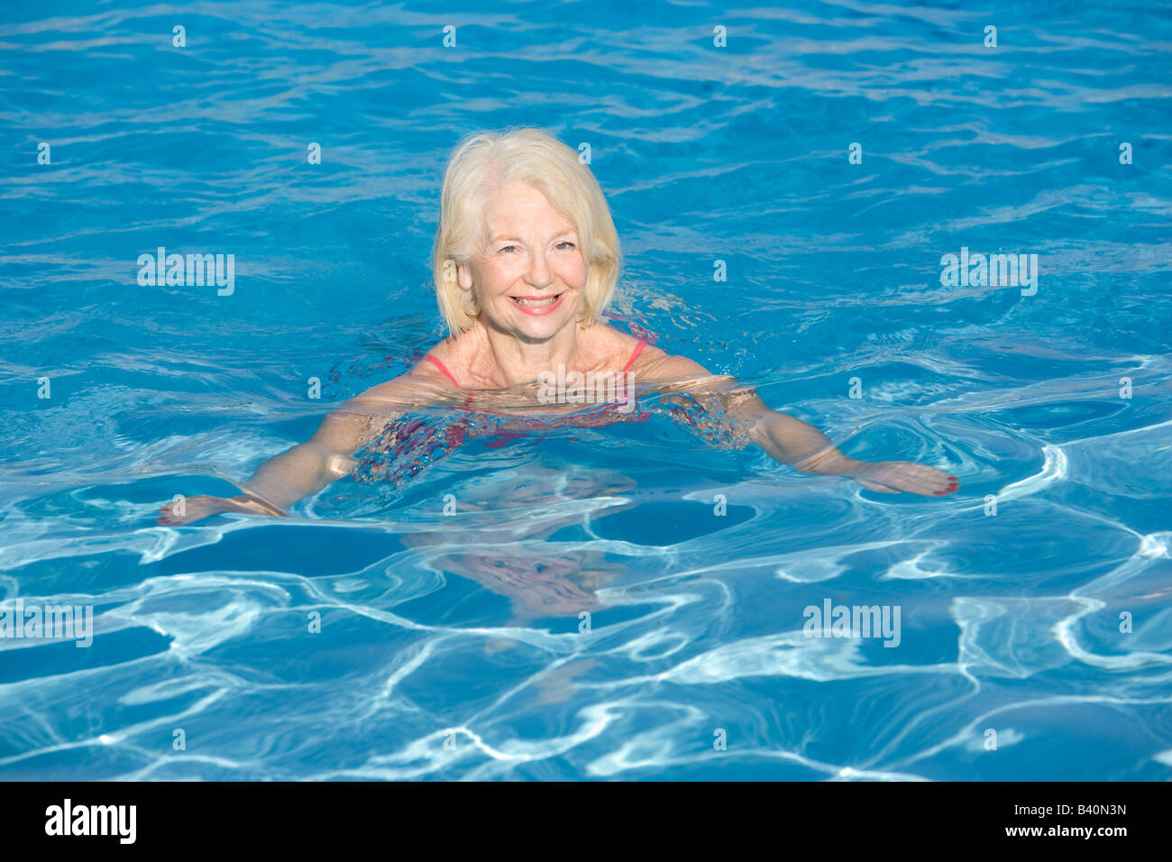 Glamourous woman swimming pool hi-res stock photography and images - Alamy