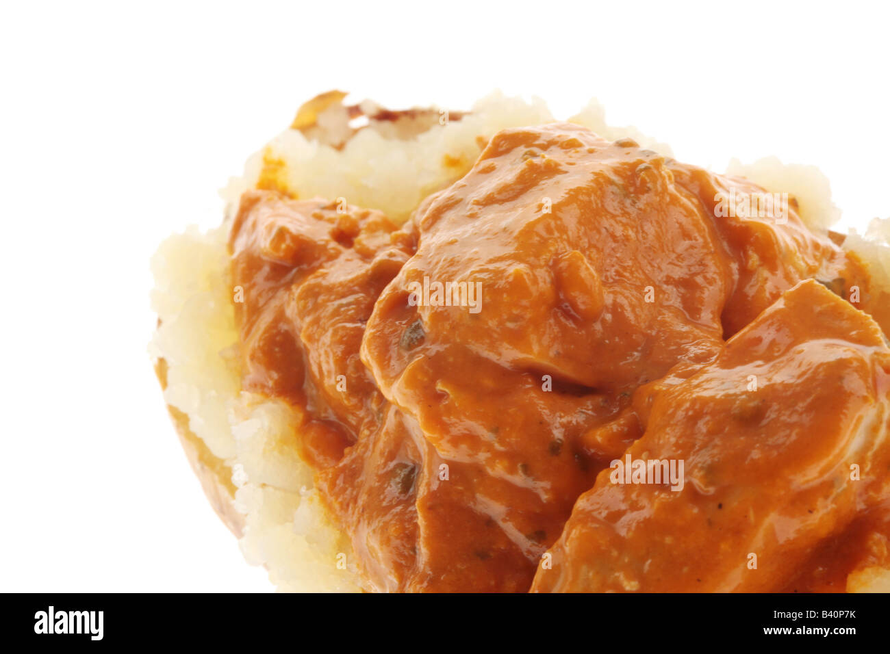Freshly Baked Jacket Potato Filled With Indian Style Spicy Chicken ...