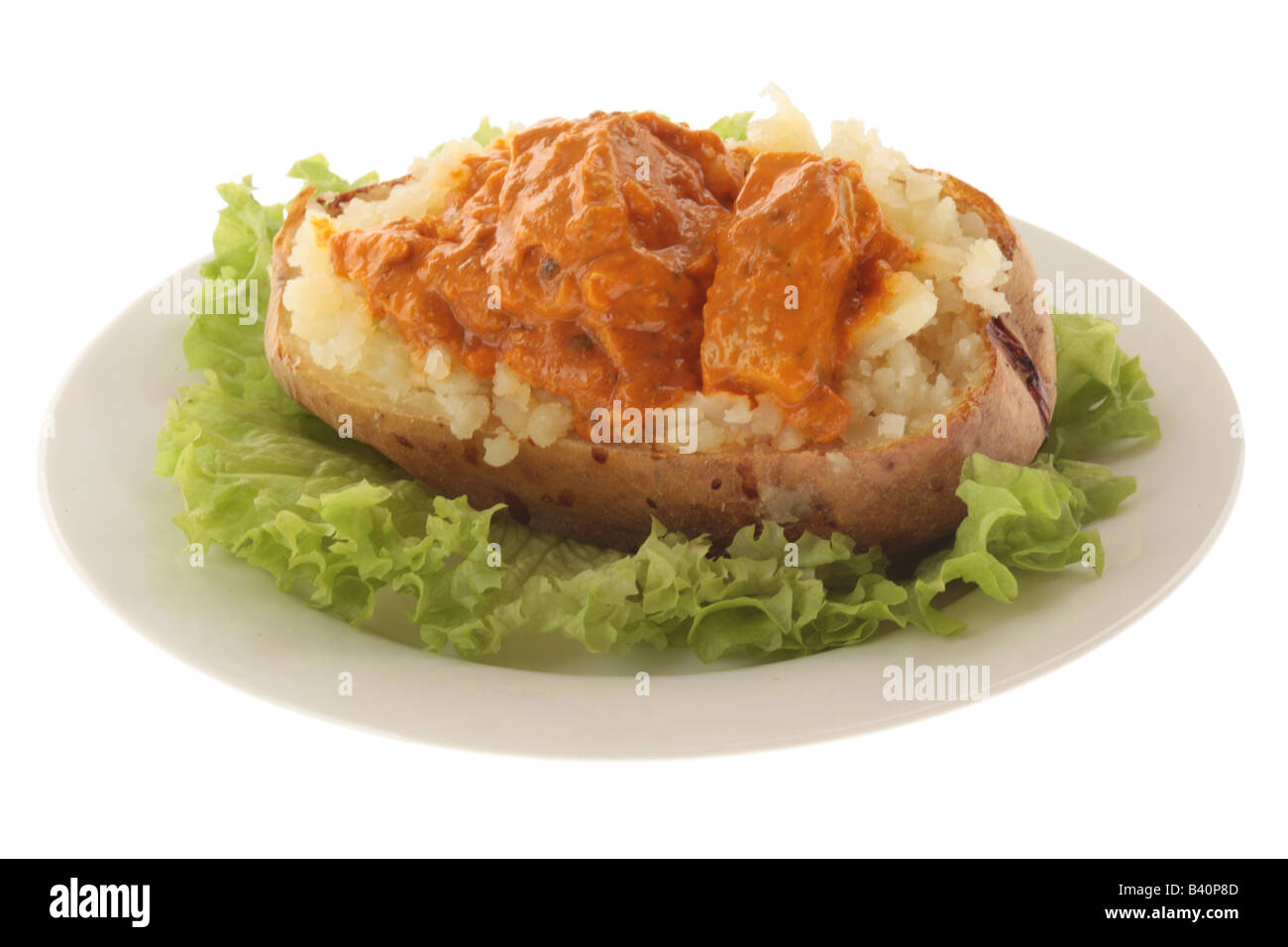 Freshly Baked Jacket Potato Filled With Indian Style Spicy Chicken ...