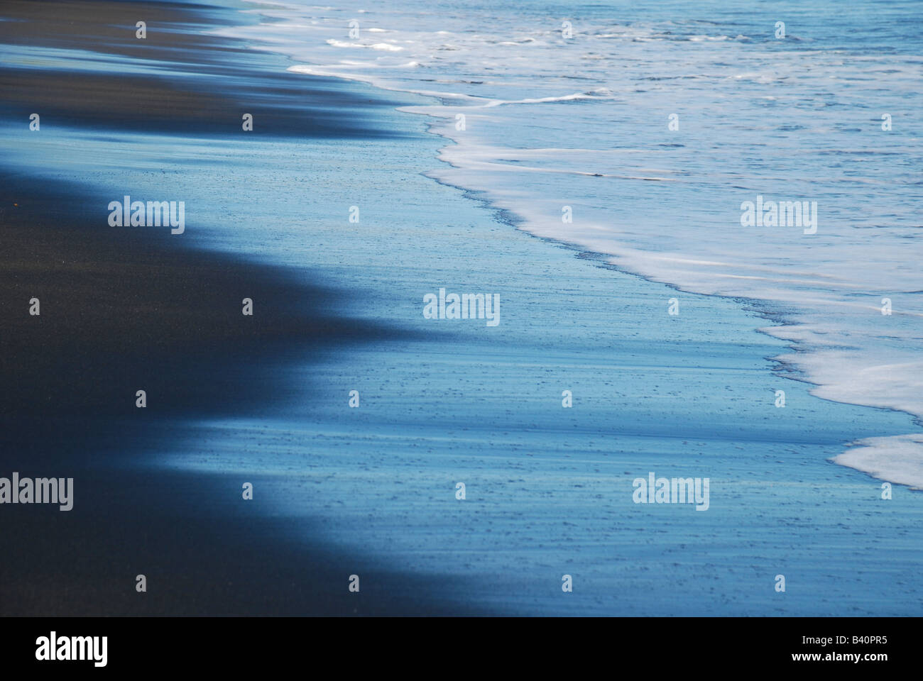 Beach with waves Stock Photo - Alamy