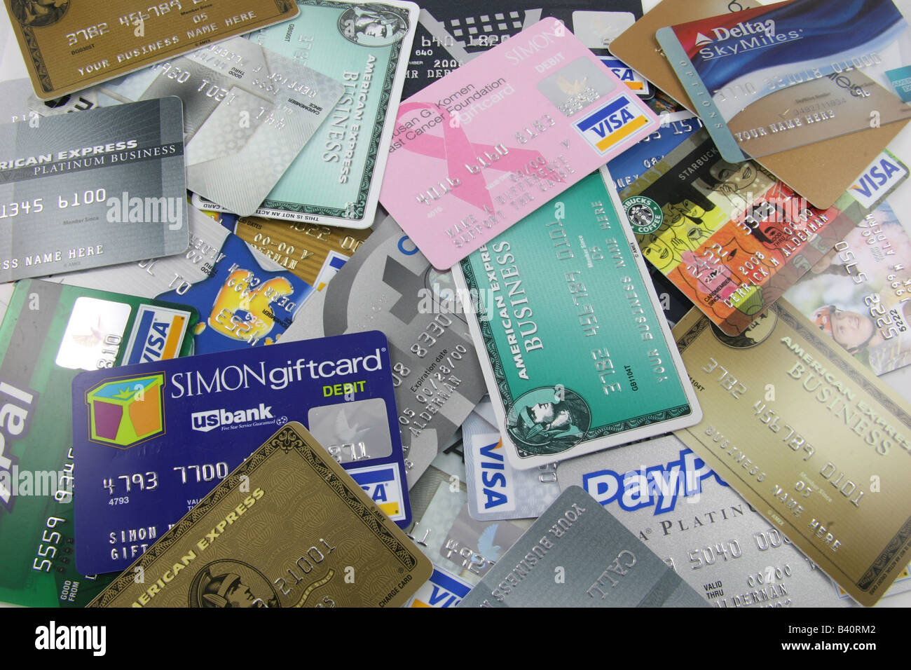 Credit cards. Numbers have been altered Stock Photo - Alamy