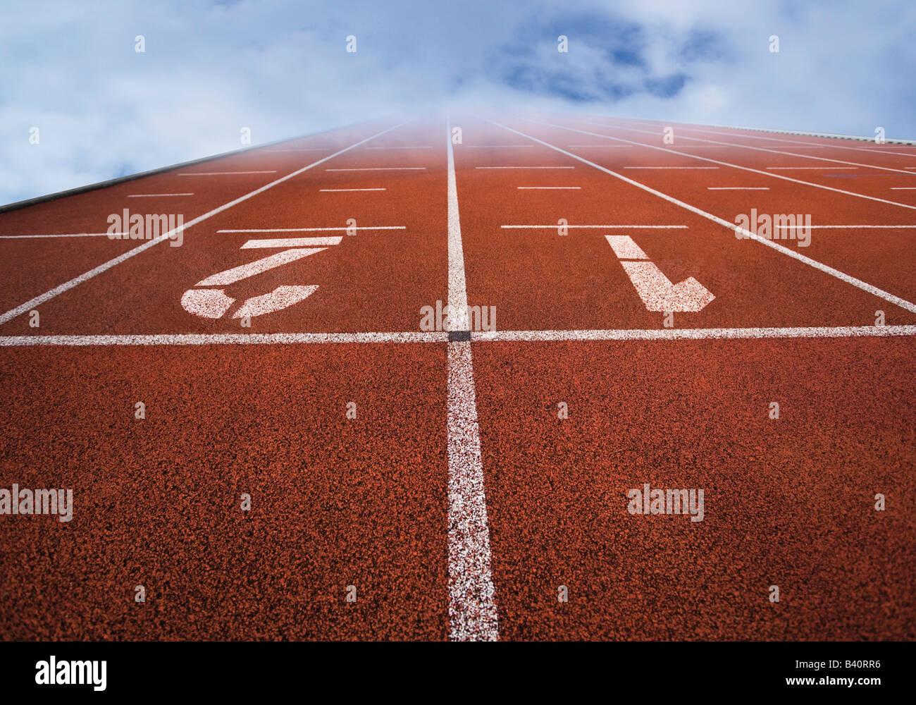 Numbered running tracks in clouds Stock Photo - Alamy
