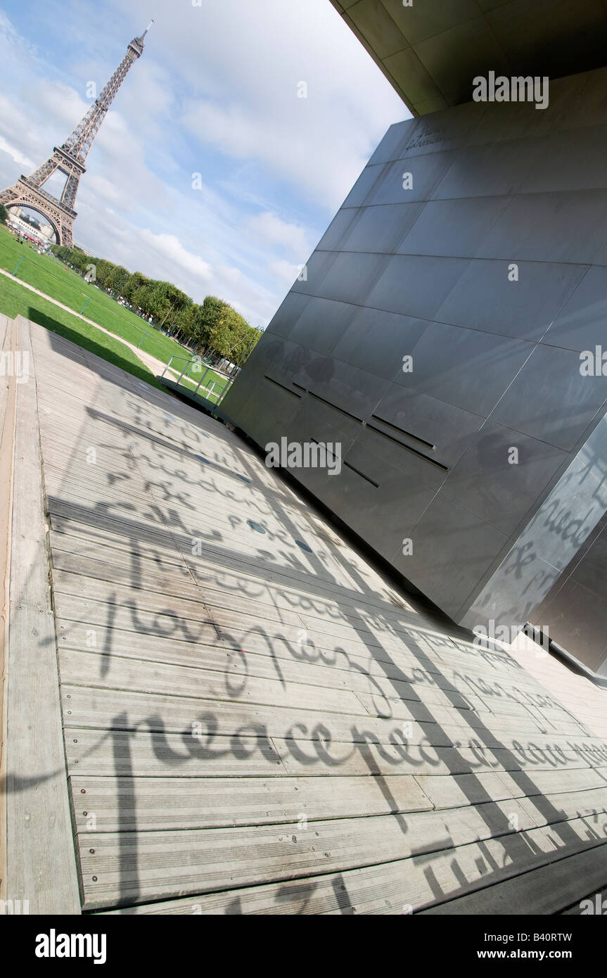 The peace monument in Champ de Mars with the Eiffel tower in the ...