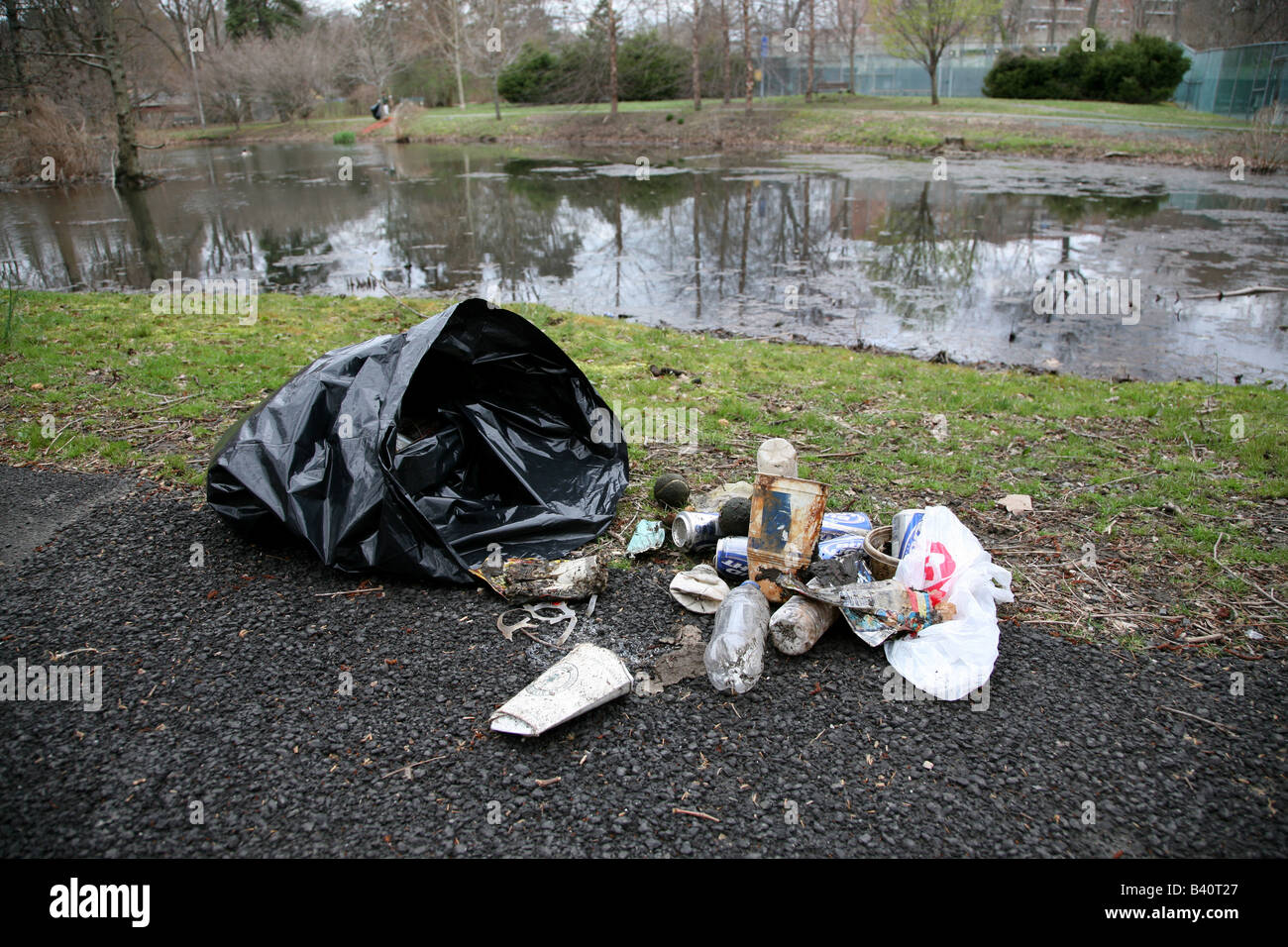 Trash bag with litter gathered from spring park clean-up Stock Photo ...