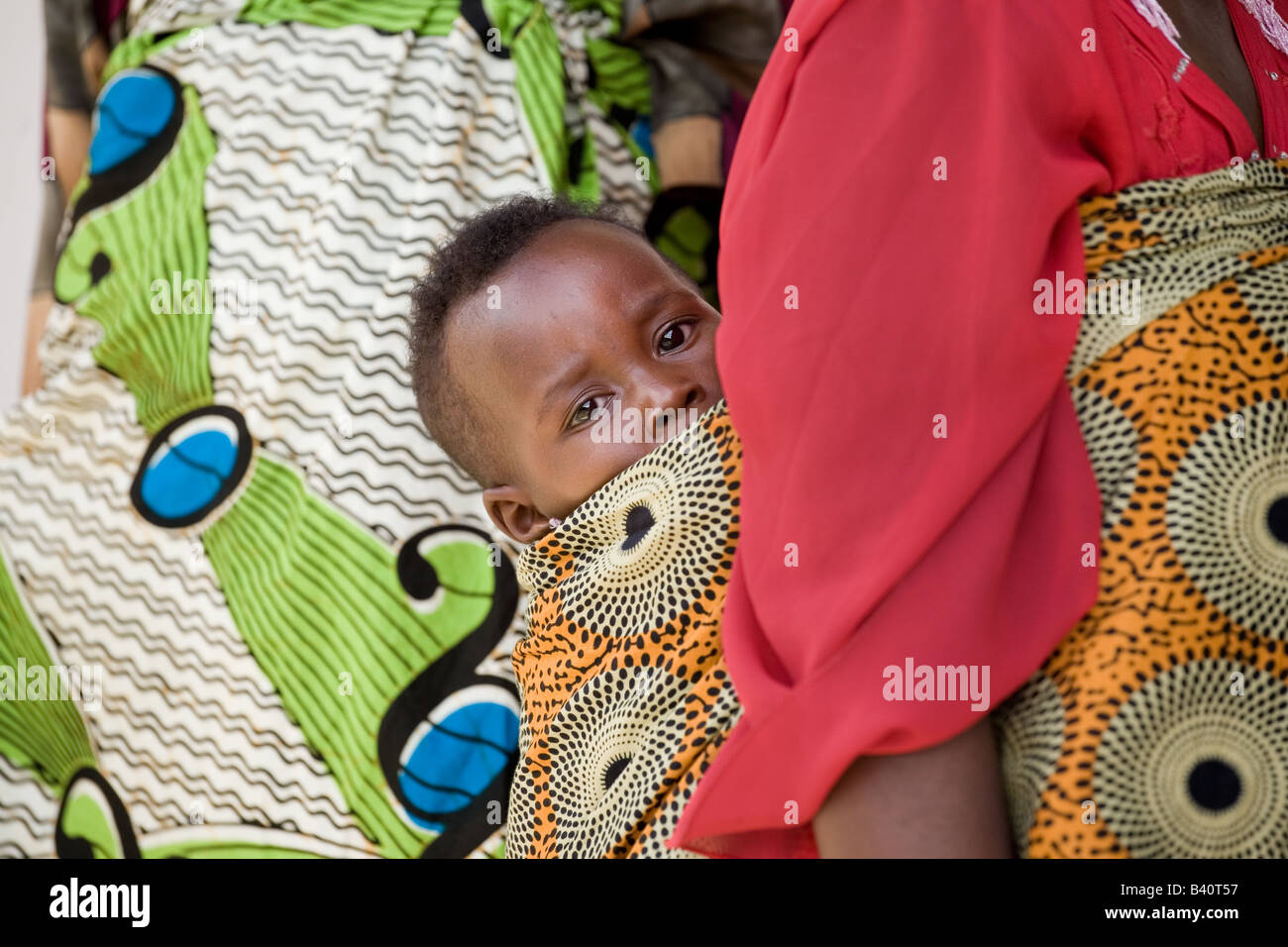 Baby strapped back hi-res stock photography and images - Alamy