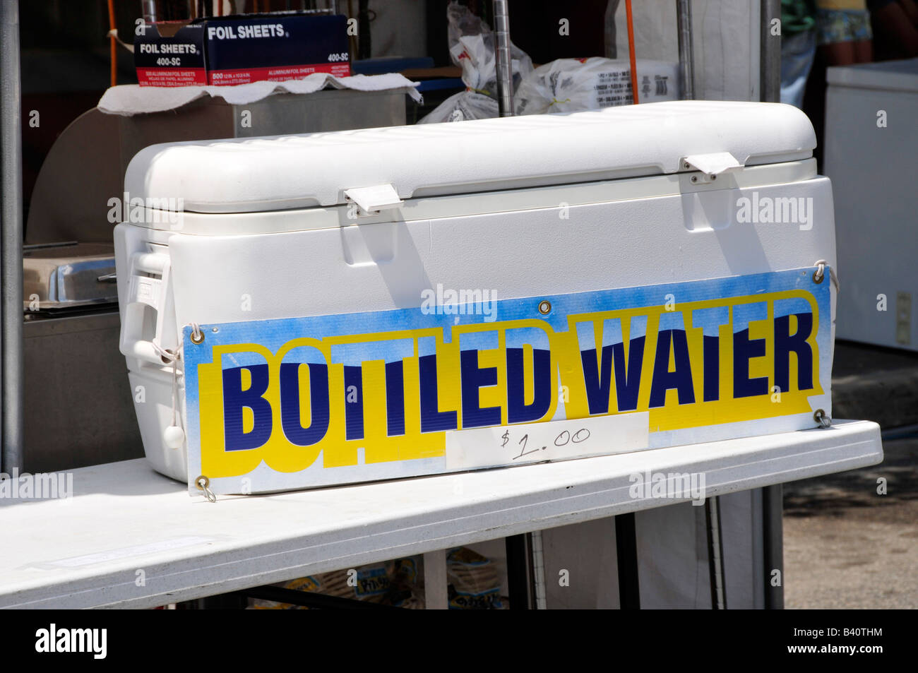 Bottled water for sale at a festival event Stock Photo - Alamy