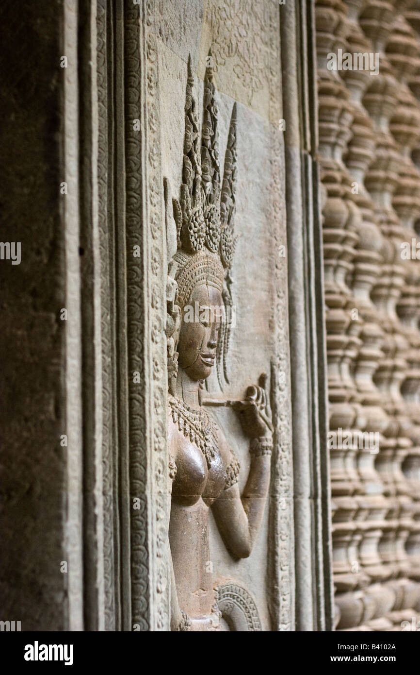 Close up angled detail of carved apsara heavenly dancer Angkor Wat ...
