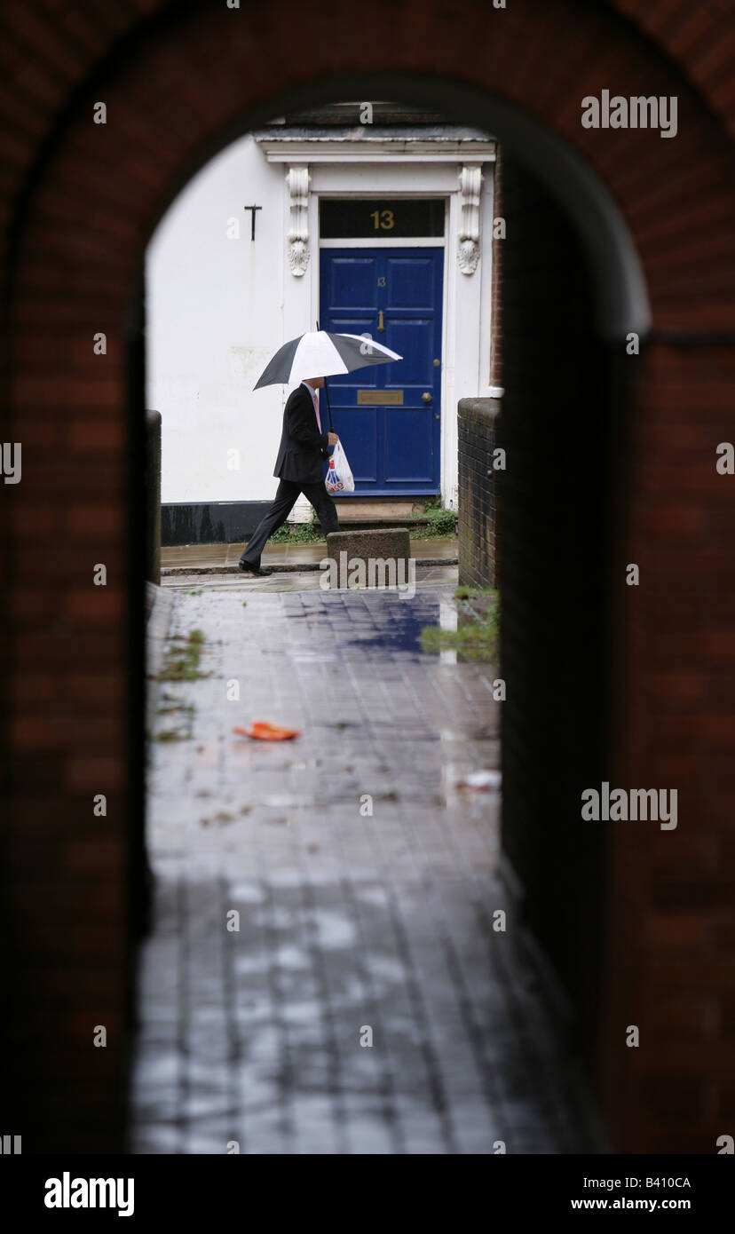 People in Exeter in the rain Stock Photo - Alamy