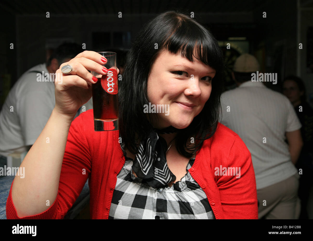 Woman aged 29 drinking alcohol Stock Photo - Alamy