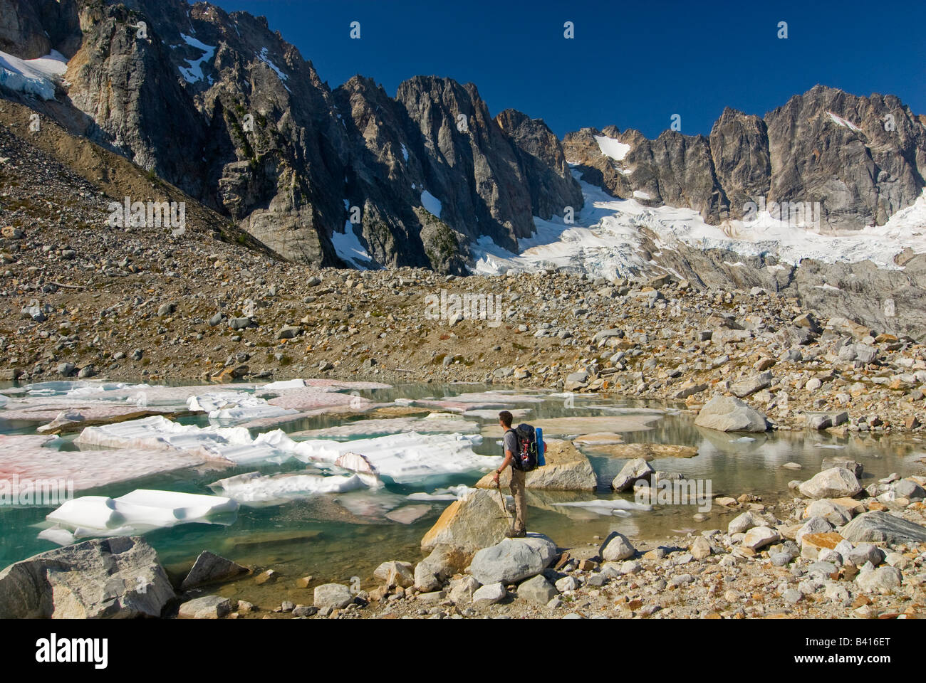 USA, Washington, North Cascades Nat'l Park. A backpacker at remote Luna ...