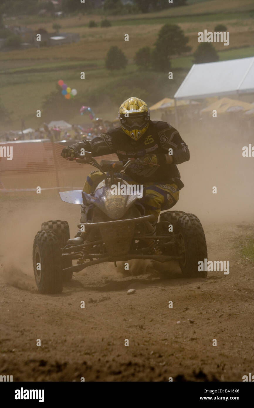 Quad rider during off road race Stock Photo - Alamy