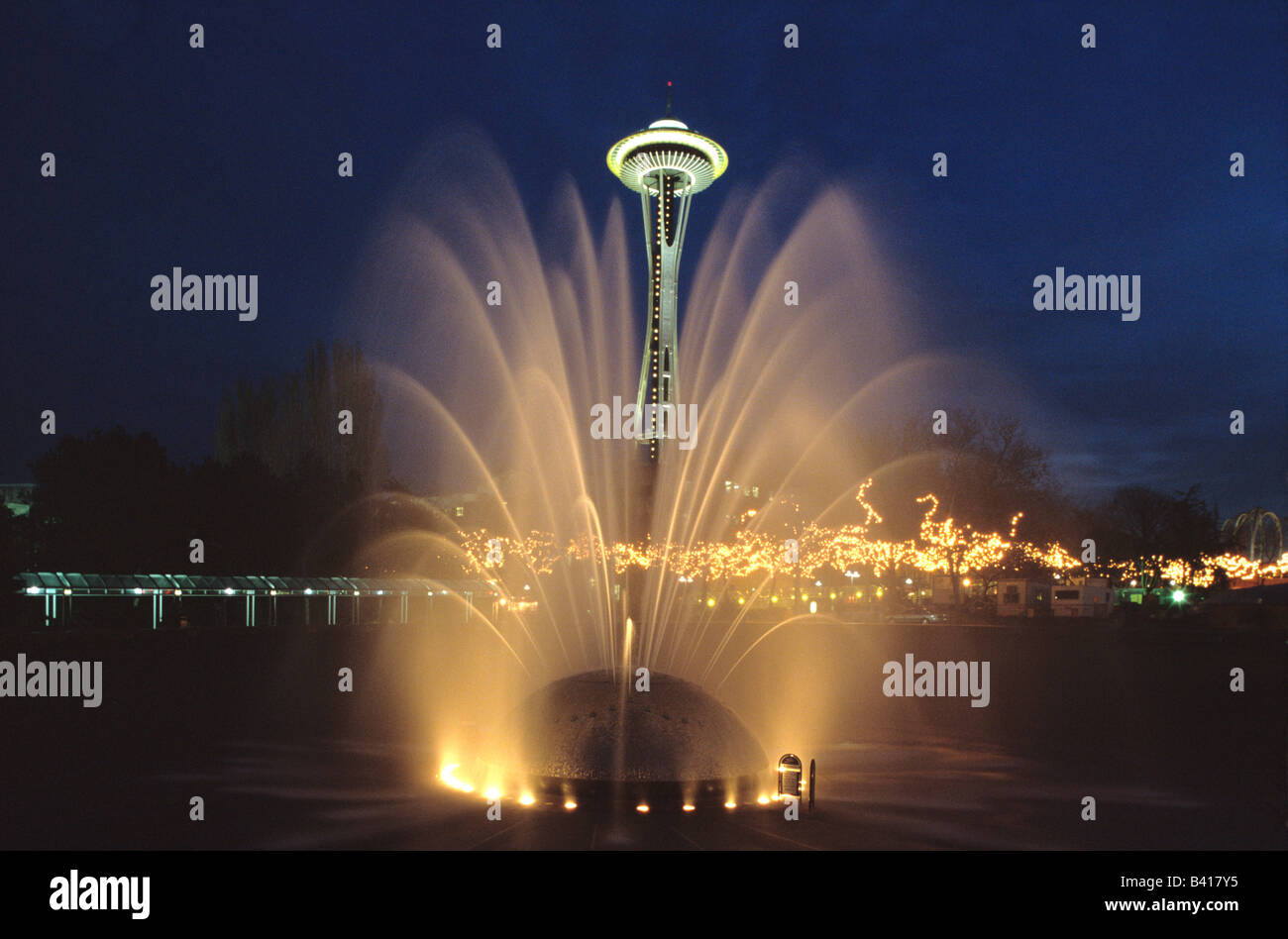 WA, Seattle, International Fountain with holiday lights and the Space ...