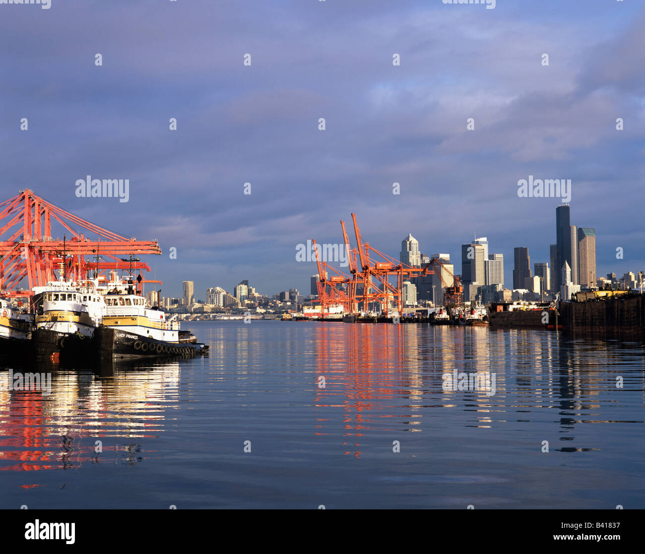 WA, Seattle, Tug boats and container ships at the Port of Seattle on ...