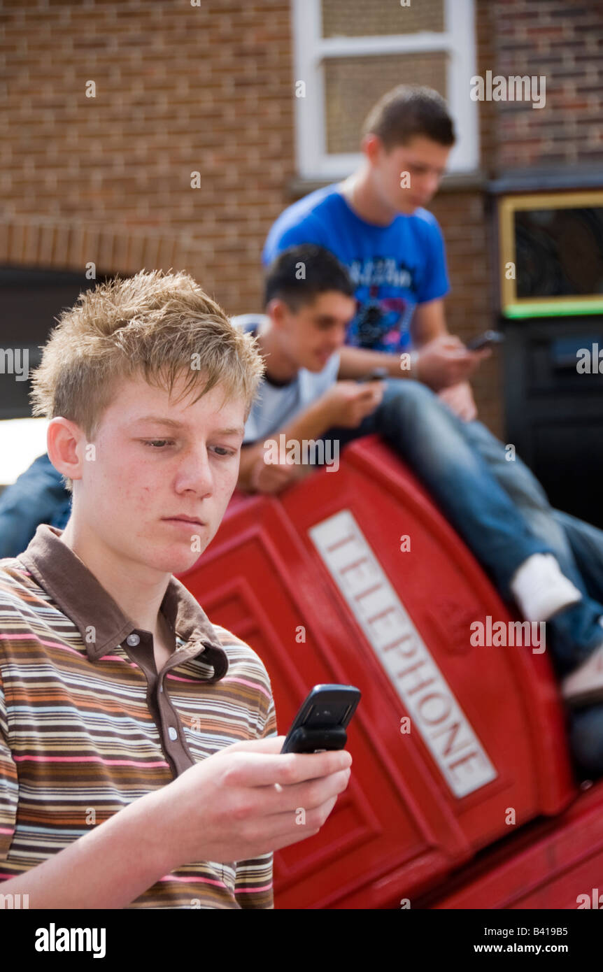Boy bully phone hi-res stock photography and images - Alamy