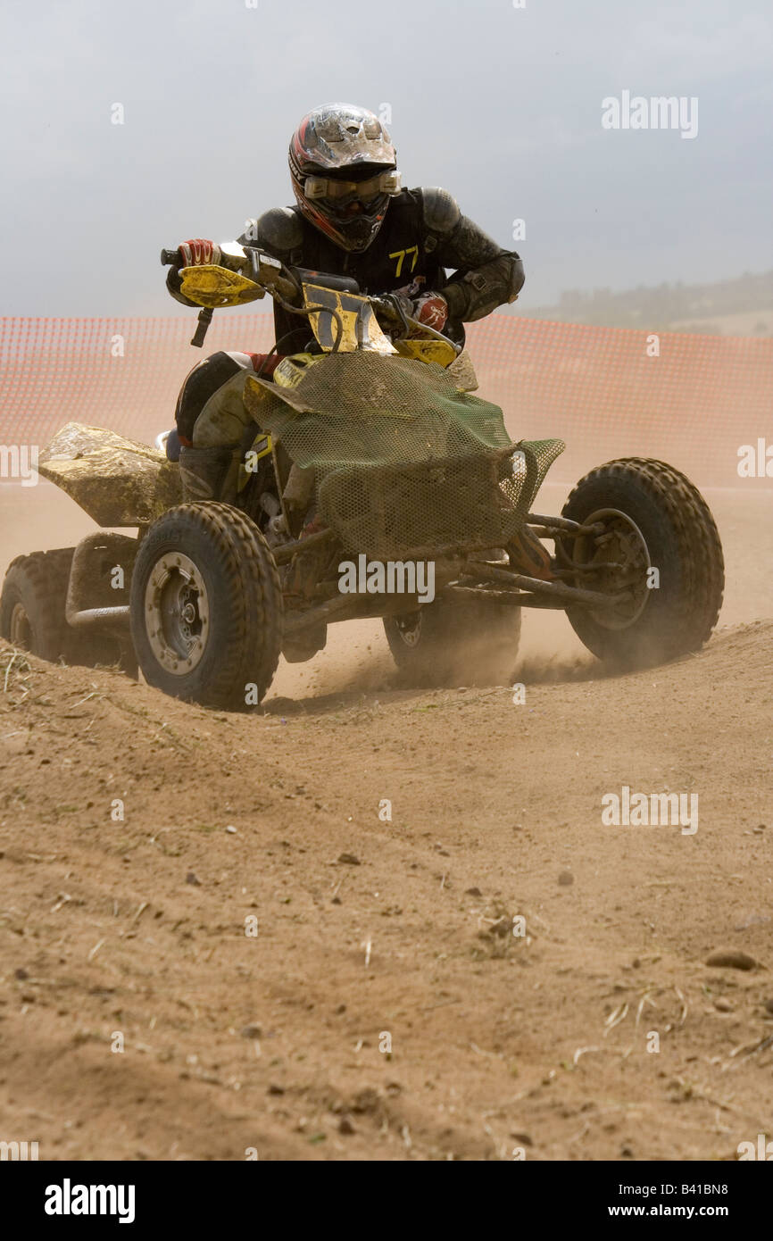 Quad rider during off road race Stock Photo - Alamy