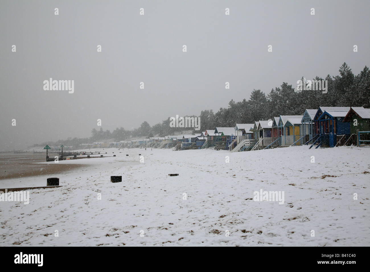 Snow storm over Beach Huts Stock Photo - Alamy