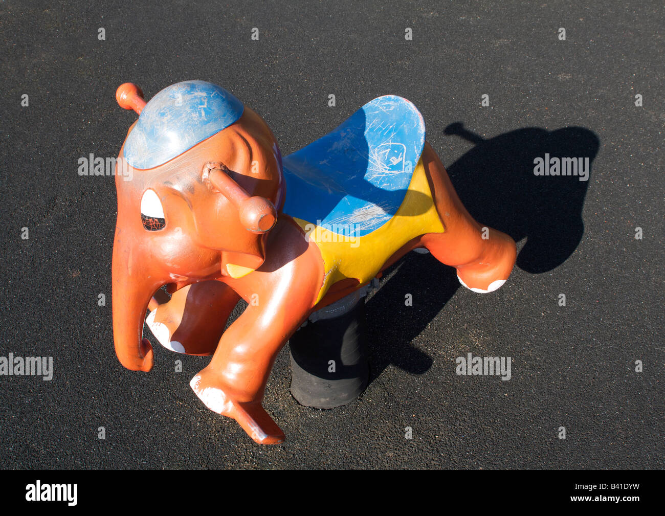 An elephant spring rider in childrens playground Stock Photo - Alamy
