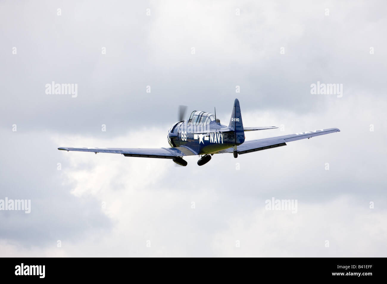 North American T6J Harvard 52-8543 66 Navy G-BUKY in flight retracting ...