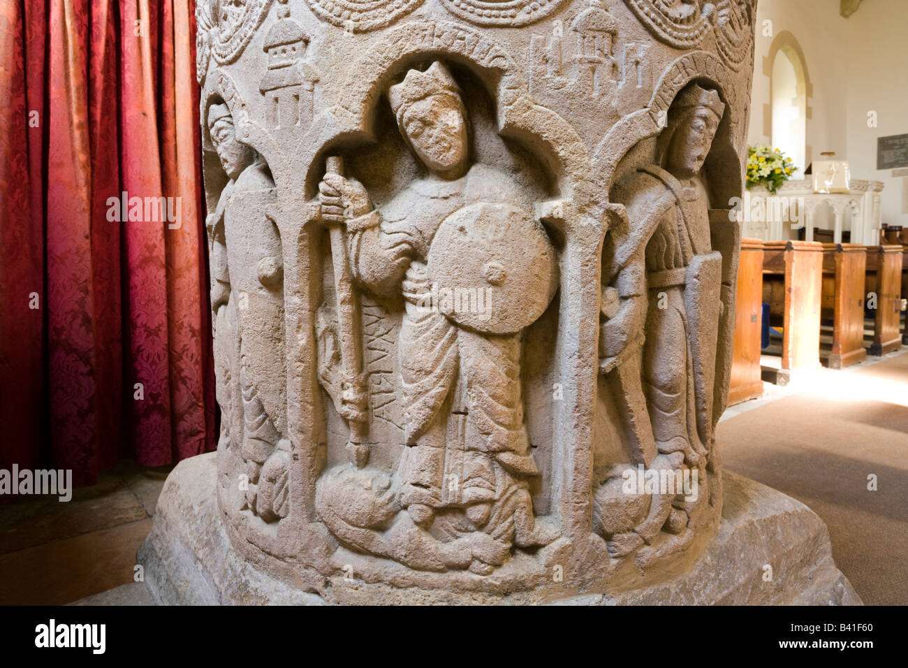 The wonderfully carved Norman font in St Peters church in the Cotswold ...