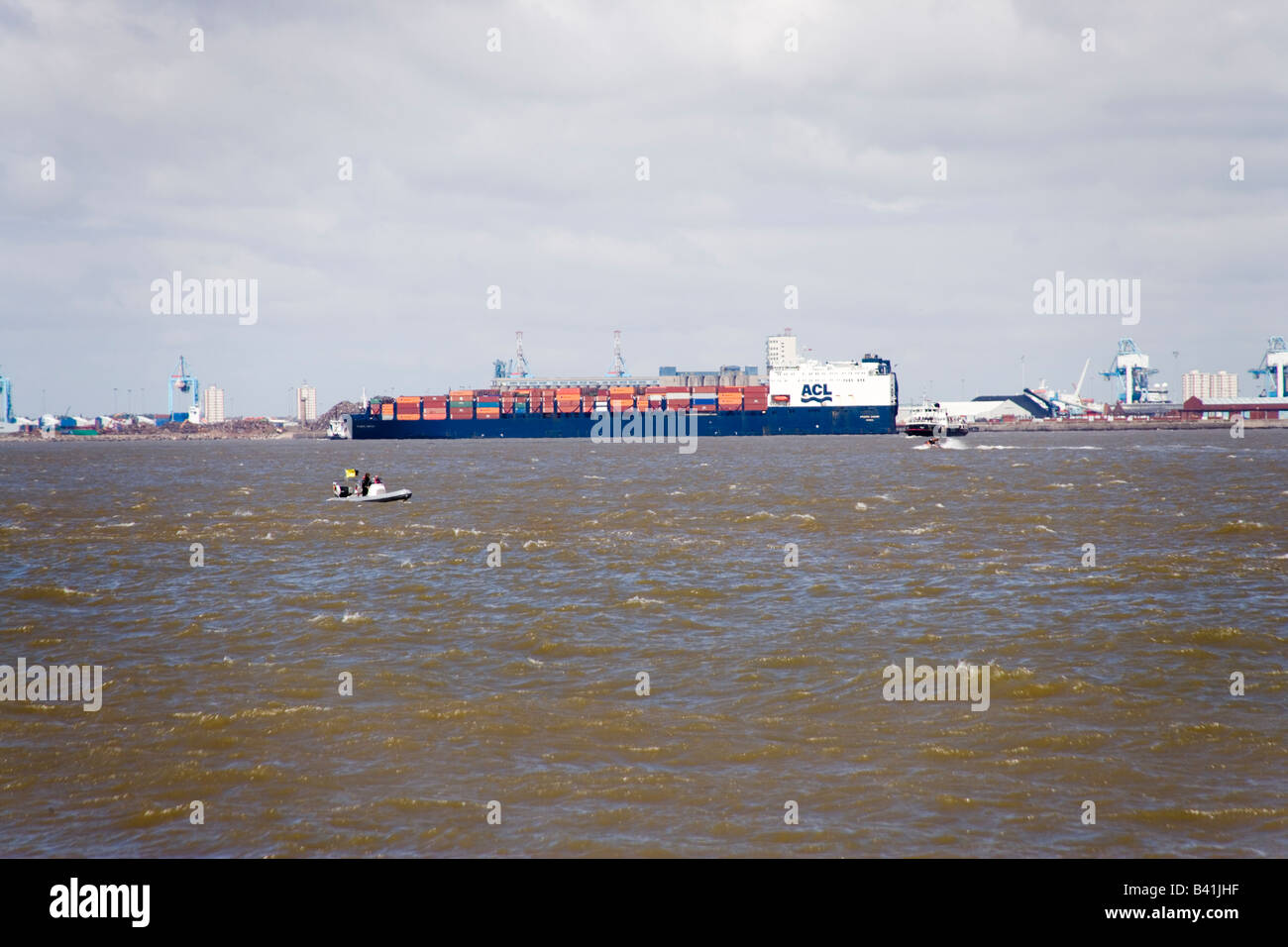 Large container ship leaving Bootle Docks, Liverpool on the Mersey ...