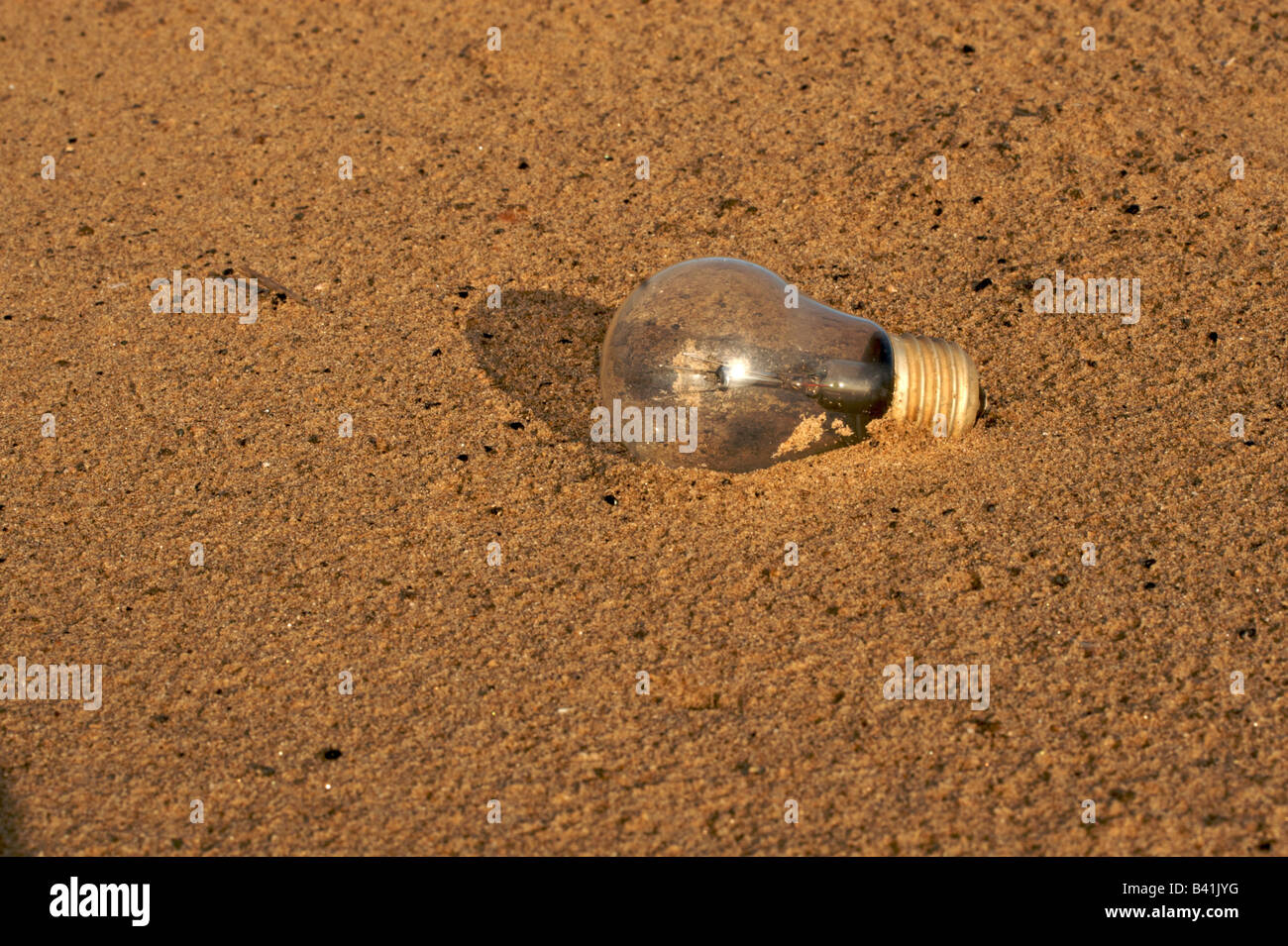 Light bulb on a sandy beach Stock Photo - Alamy