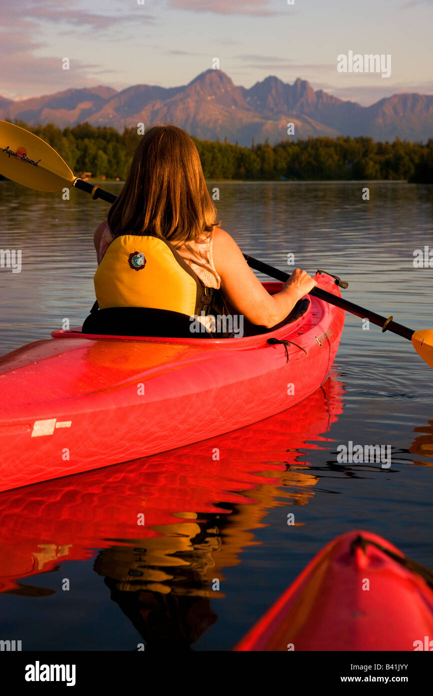 Kayaking on Finger Lake Wasilla Alaska model released Stock Photo - Alamy