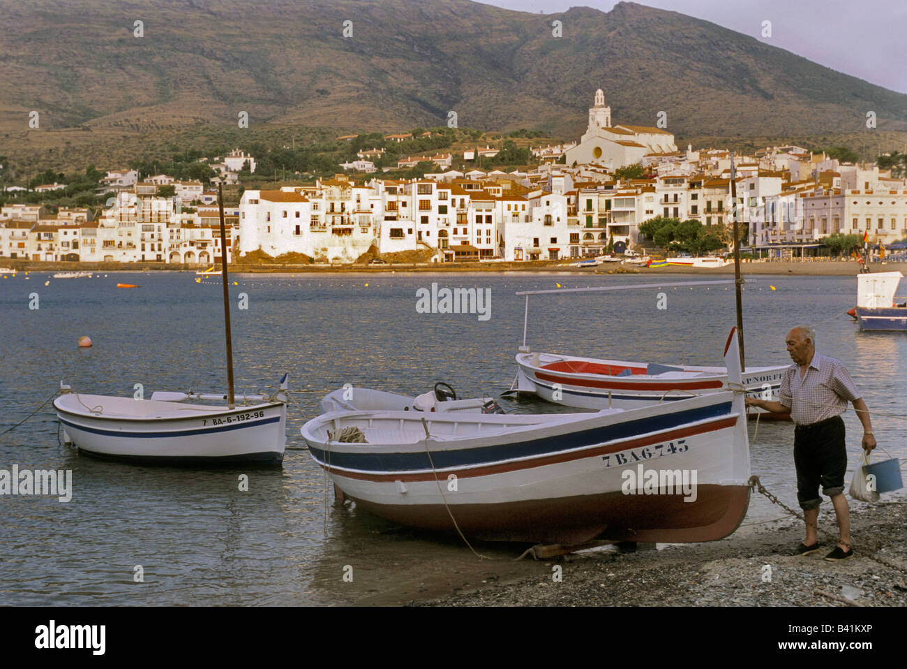 Santa Maria Church and town of Cadaques seen across Cadaques Bay Costa ...