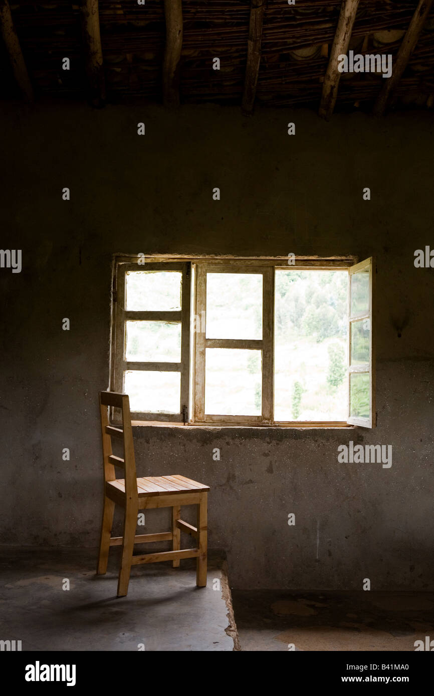 A lonely chair sits by a classroom window in Rwanda Stock Photo - Alamy