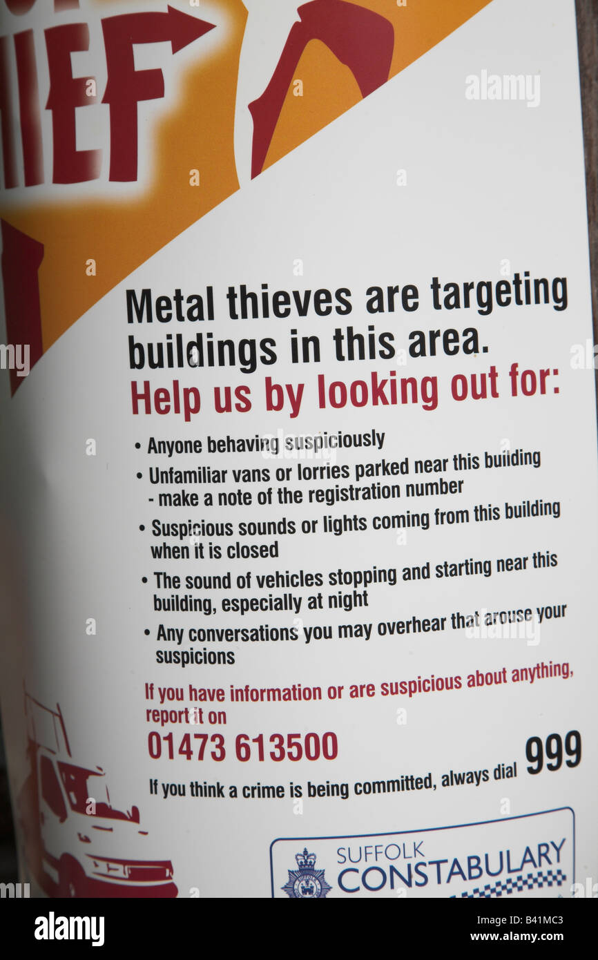 Metal thieves warning sign Stock Photo - Alamy