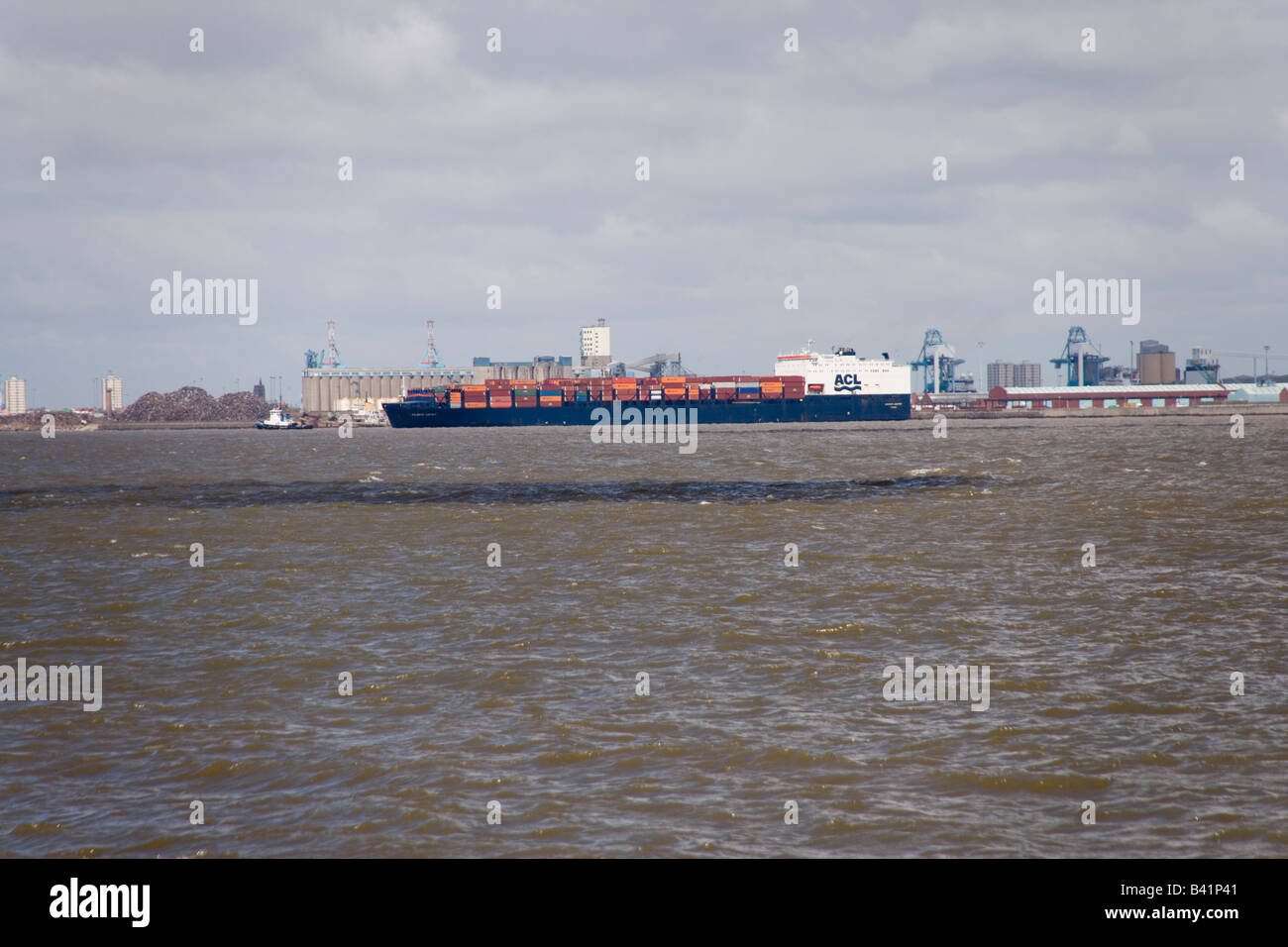 Large container ship leaving Bootle Docks, Liverpool on the Mersey ...