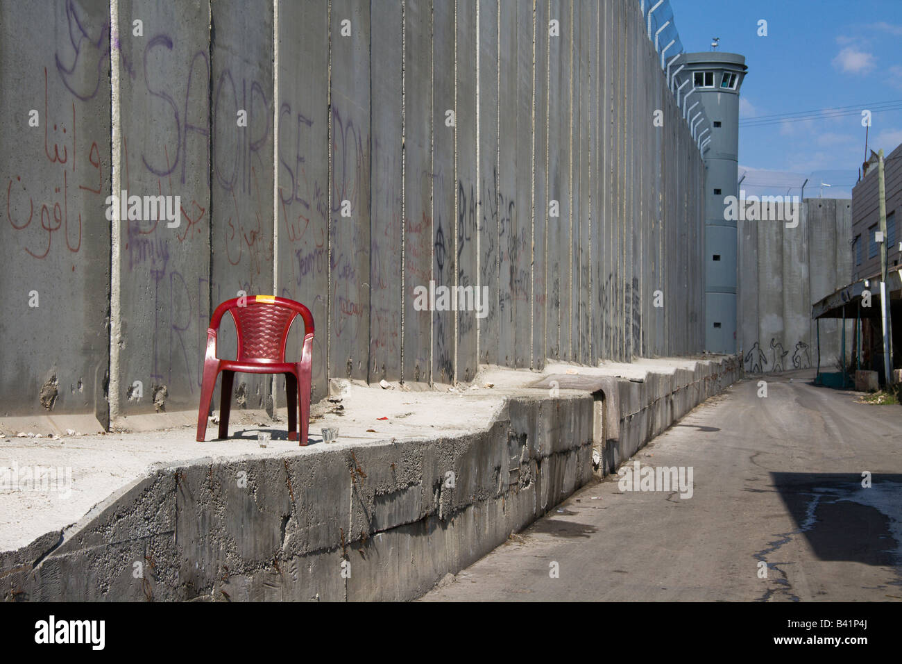 A red chair along the separation, Palestine Stock Photo - Alamy