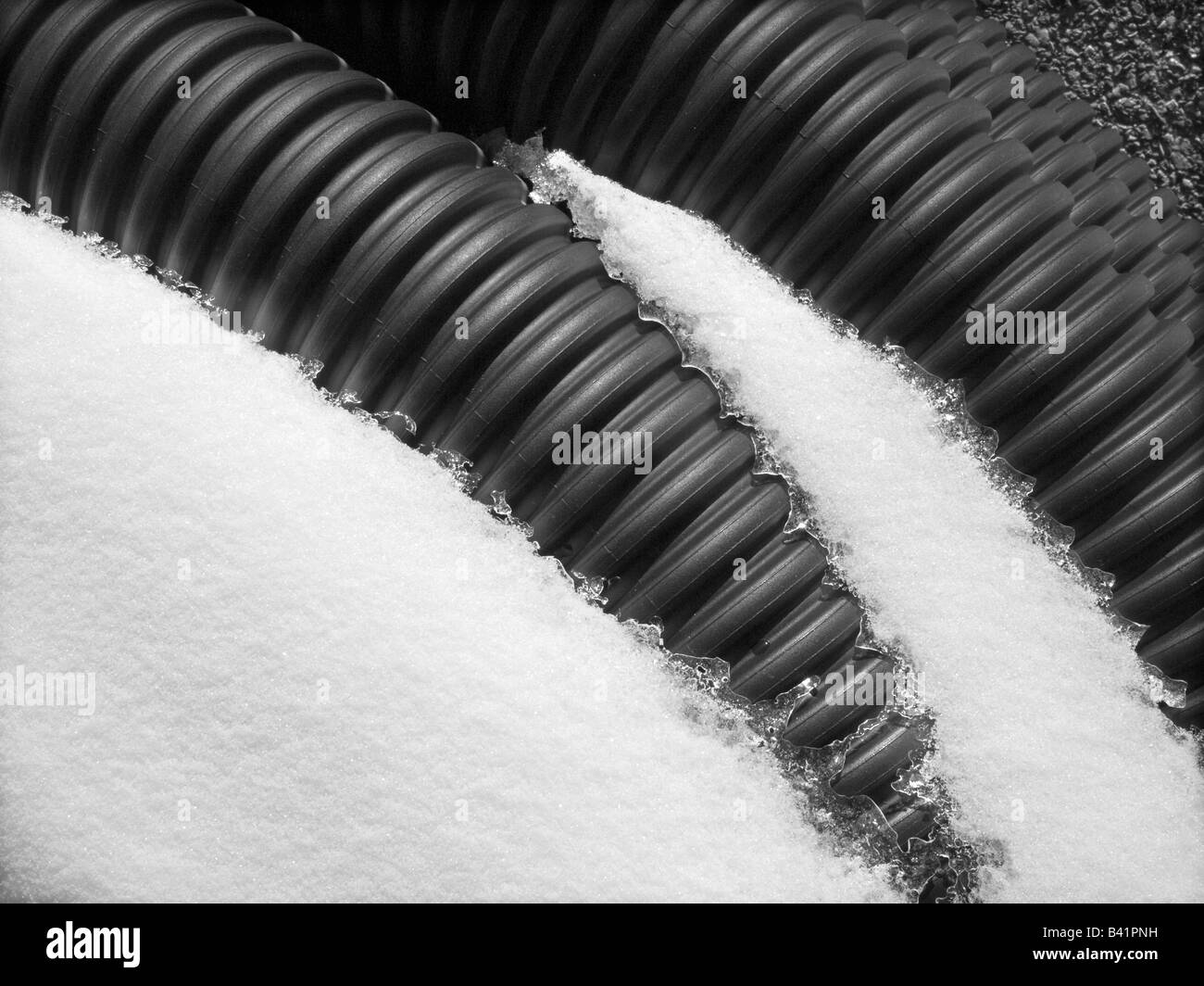 Coiled plastic pipe Black and White Stock Photos & Images - Alamy