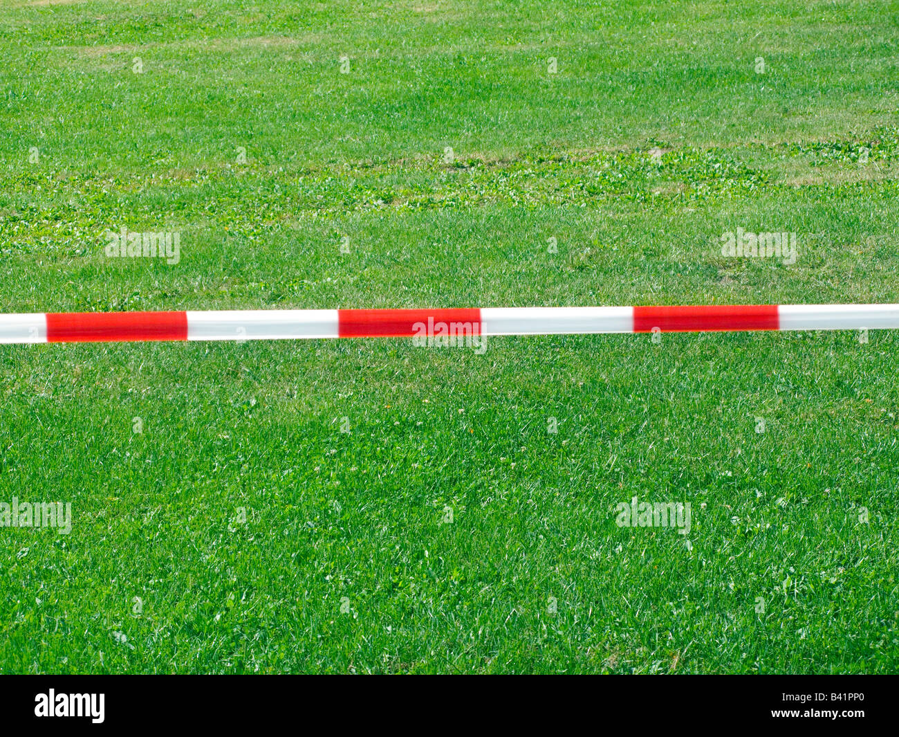 Line and green grass field Stock Photo - Alamy