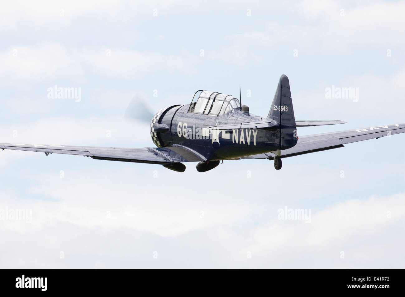 North American T6J Harvard 52-8543 66 Navy G-BUKY in flight retracting ...