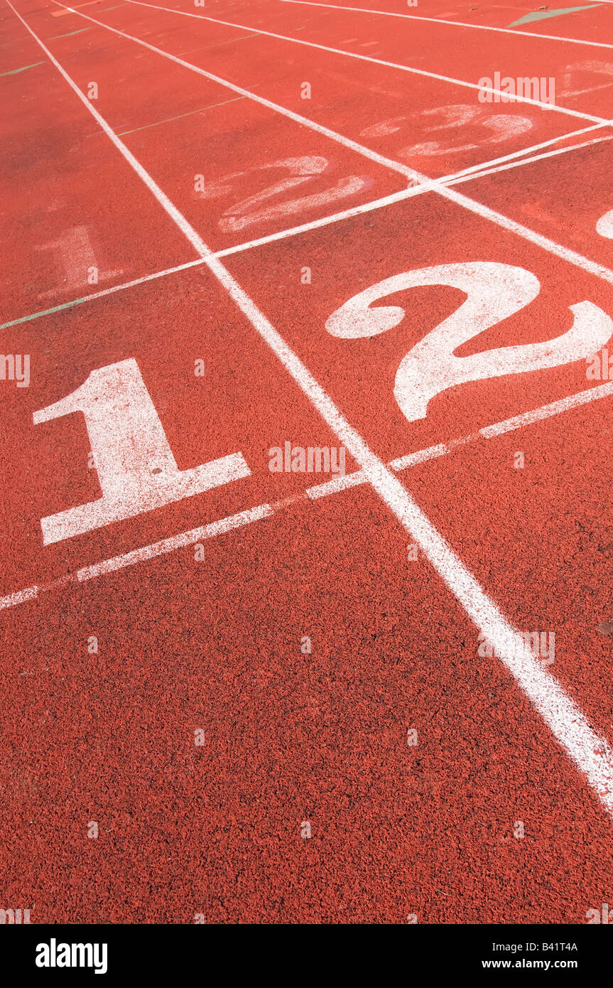 Numbered lanes on outdoor rubberized track Stock Photo - Alamy