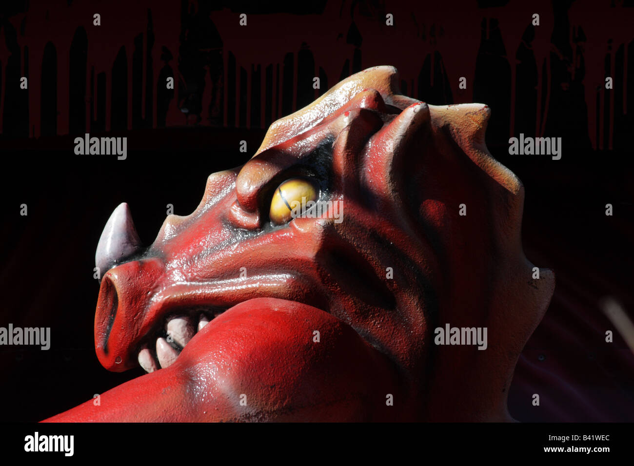 BACK VIEW SCARY RED DRAGON MASK HORIZONTAL BDB11311 Stock Photo - Alamy