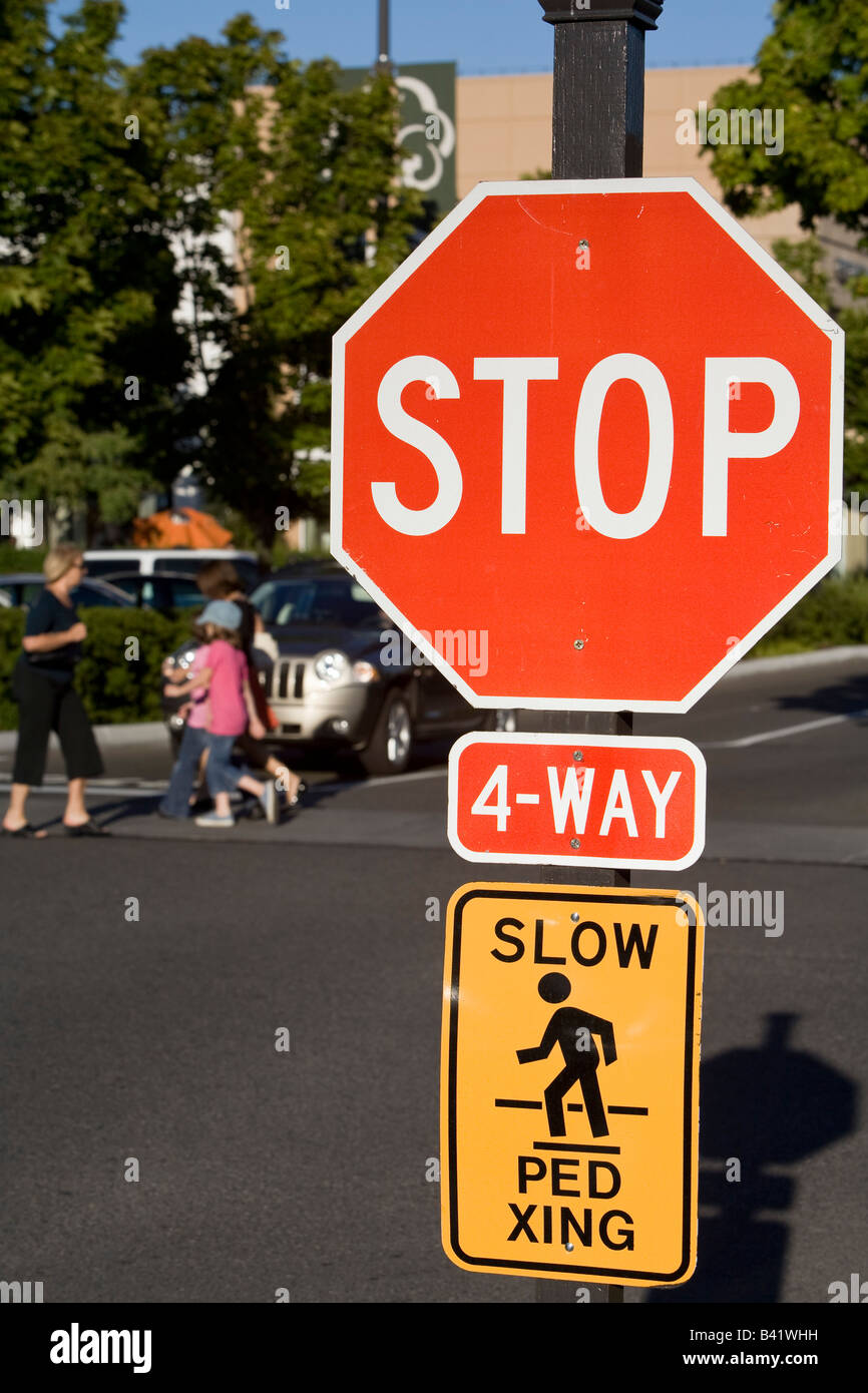 Stop sign crosswalk pedestrians Stock Photo - Alamy