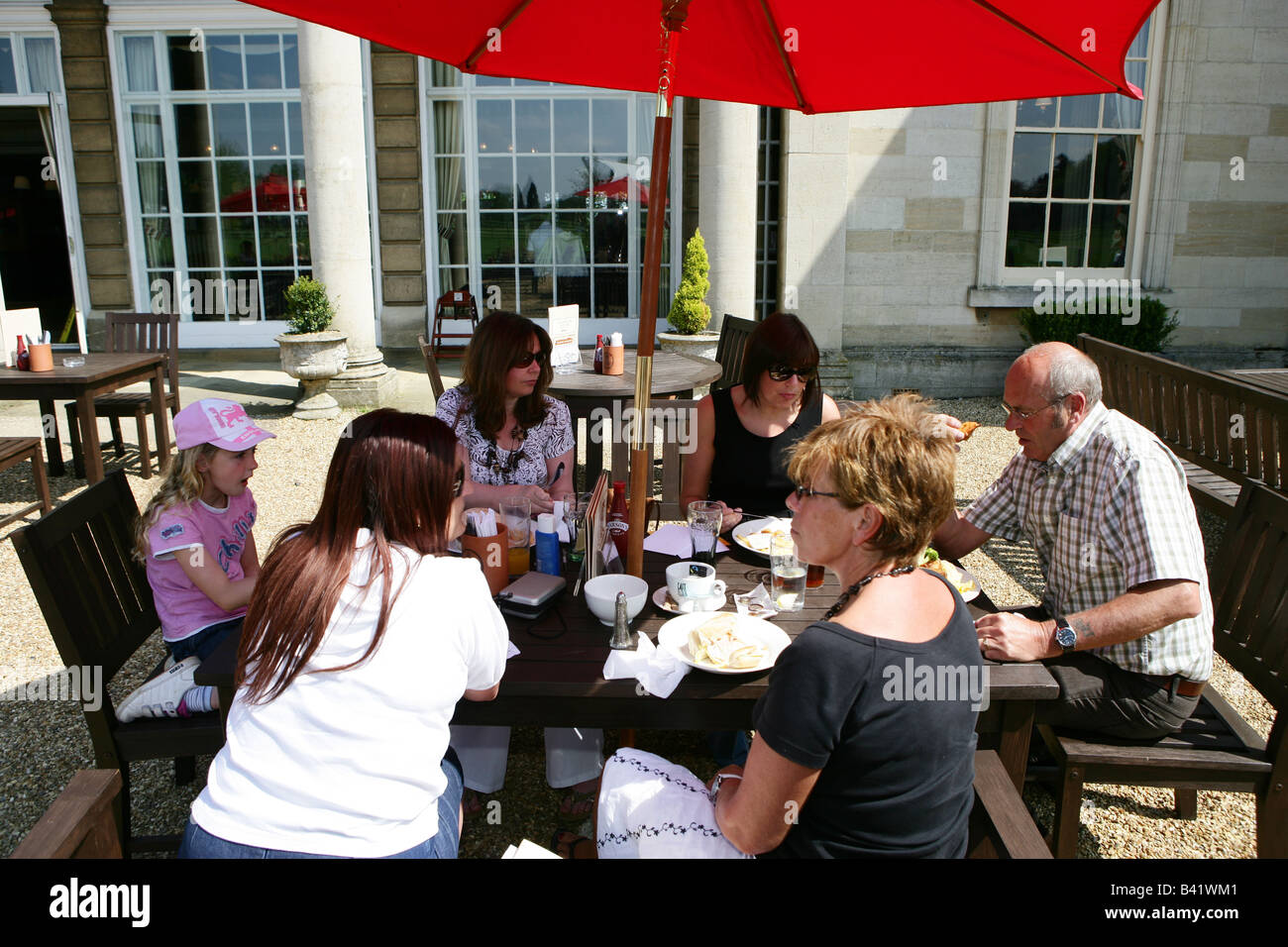 Family in pub Stock Photo - Alamy