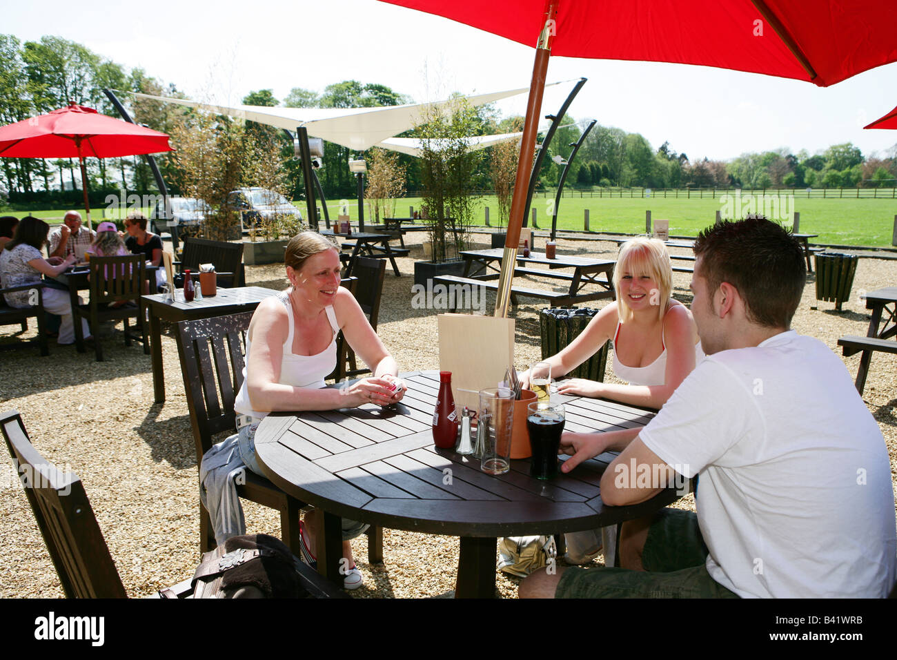 Family in pub Stock Photo - Alamy