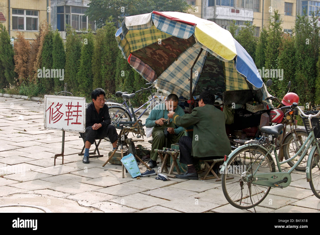 Street cobbler hi-res stock photography and images - Alamy