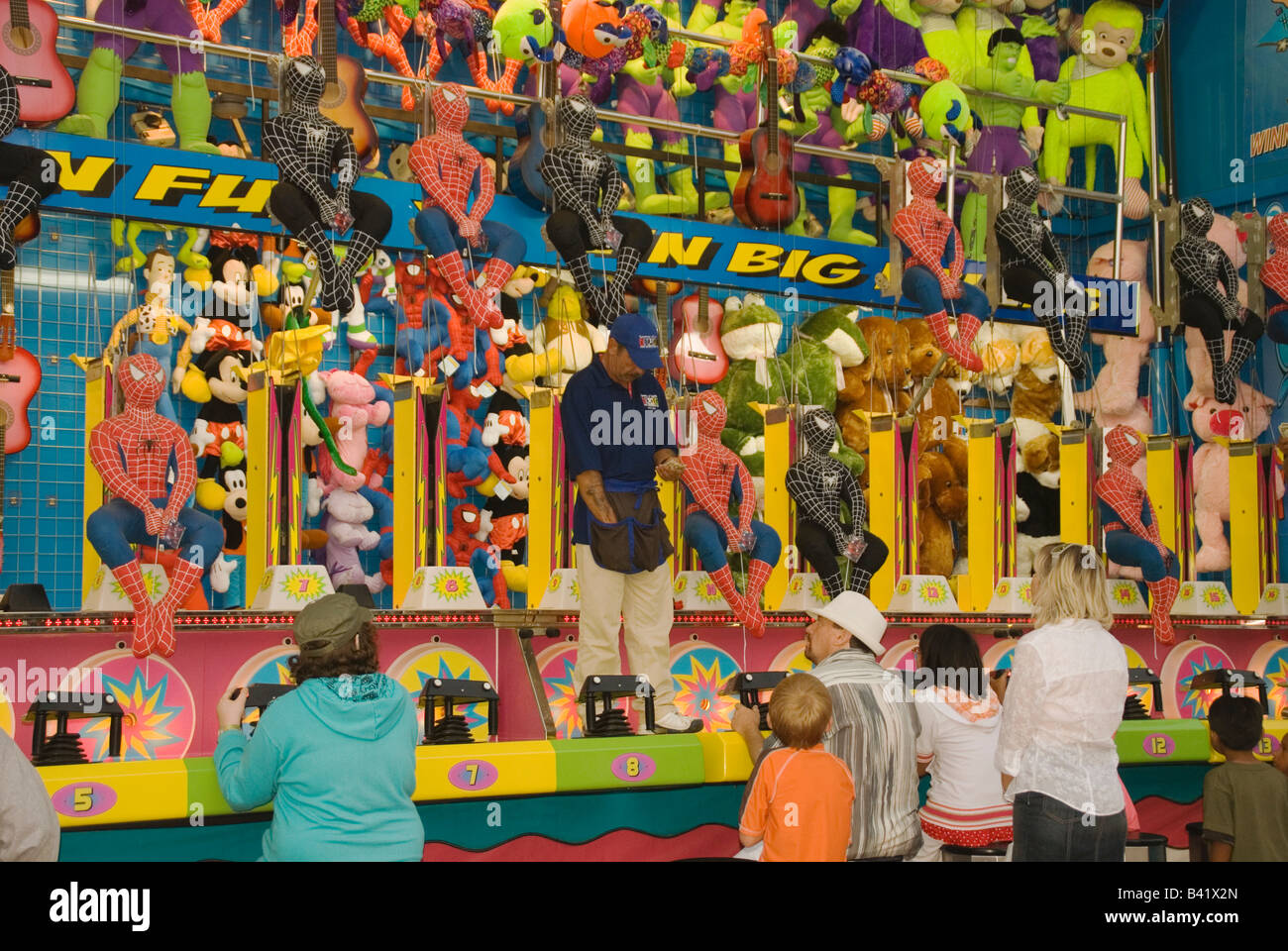 fairgoers try to win prizes at the Del Mar Fair, Del Mar California ...
