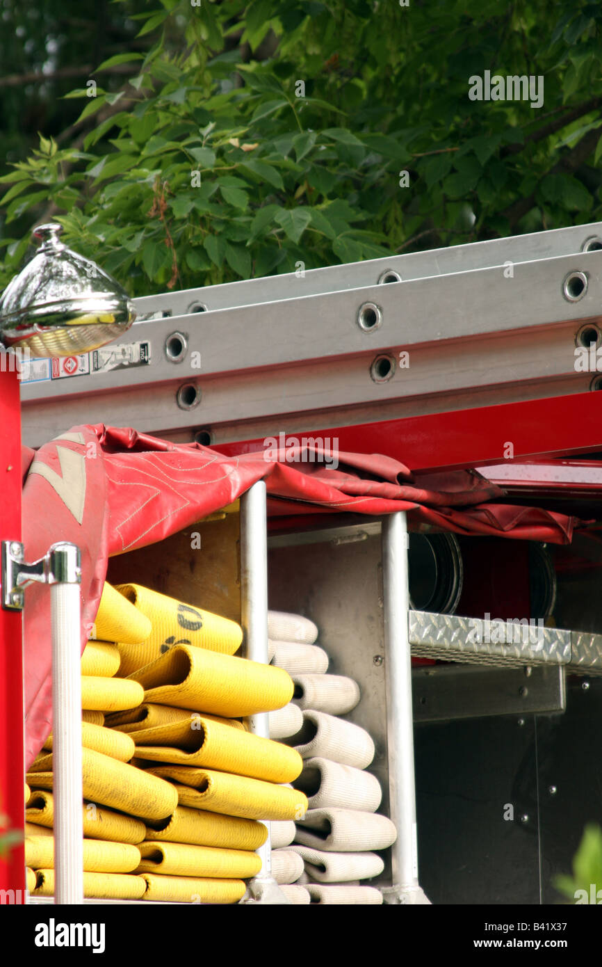 The back of a fire engine where the waterline hoses are kept ready to ...