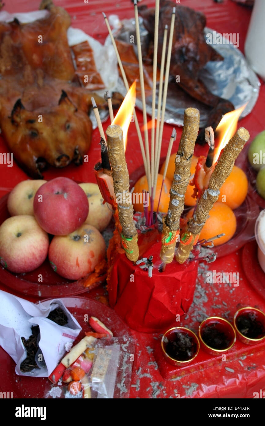 Roast pig and duck offerings, Taoist festival of the hungry ghosts ...