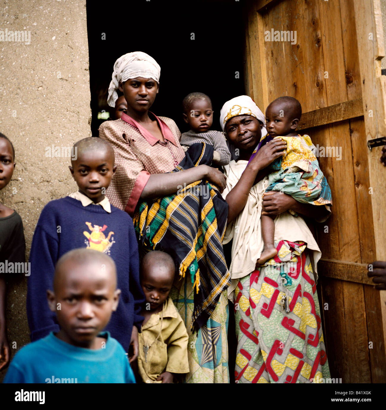 A couple mothers and a group of children gather for a photo in Gisenyi ...