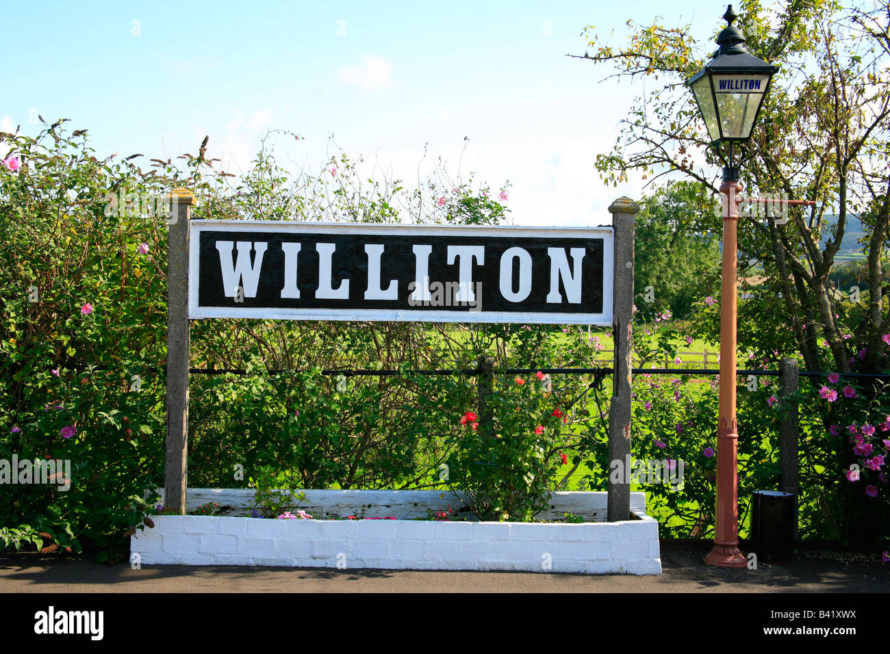 williton station sign and lamp Stock Photo - Alamy