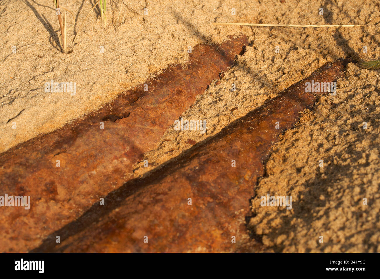 Rusty metal on the beach Stock Photo - Alamy