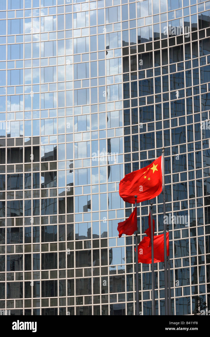 Chinese national flags against a modern building Stock Photo - Alamy
