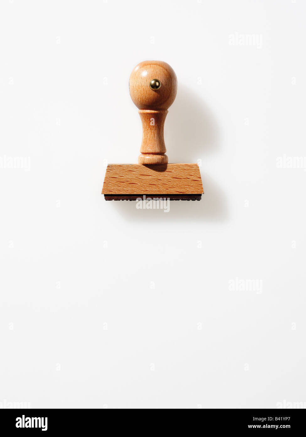 Wooden rubber stamp on white background copy space at bottom Stock ...