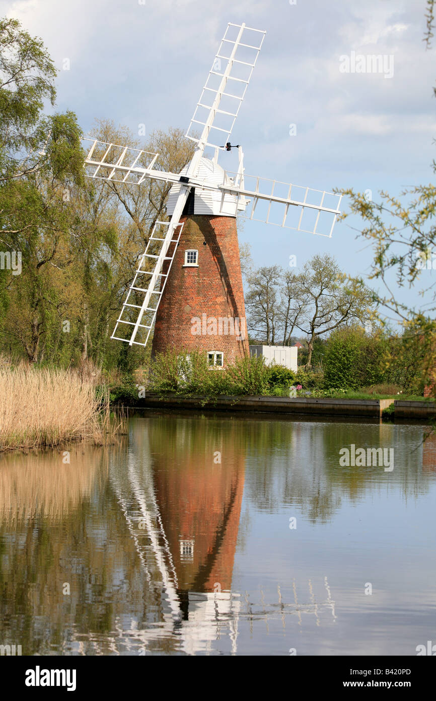 Windmill reflecting in River Stock Photo - Alamy